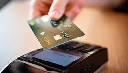 A person holding a card.